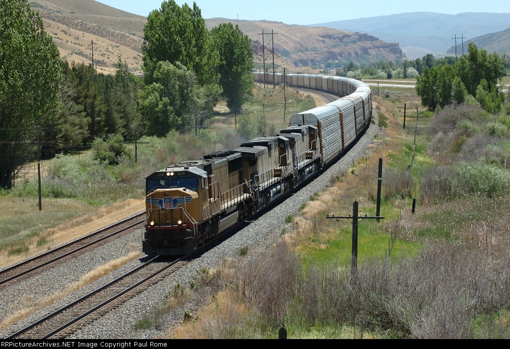 UP 4241 leads UP 9739 and UP 9598 on the AGBMI auto!train westbound